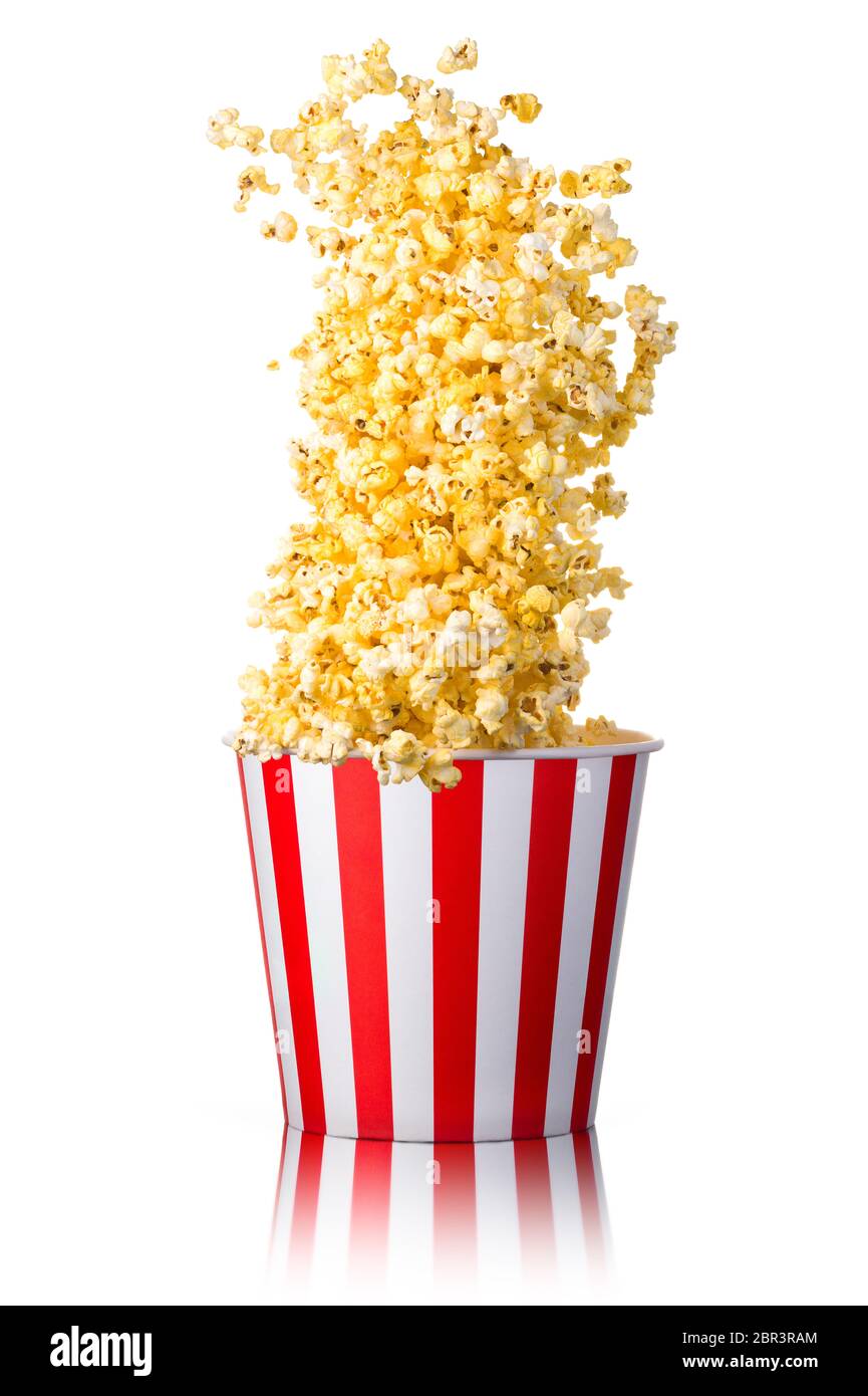 Flying popcorn from paper striped bucket isolated on white background ...