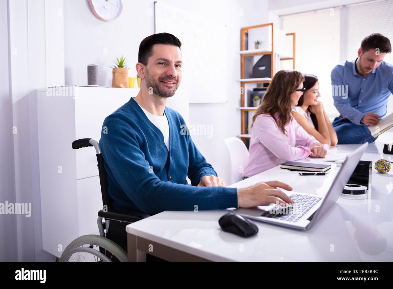 Electric wheelchair office hi-res stock photography and images - Alamy