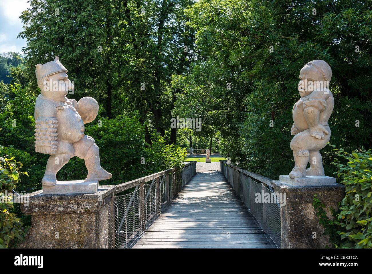 Two white marble dwarfs at the entrance to the Dwarf Garden ...