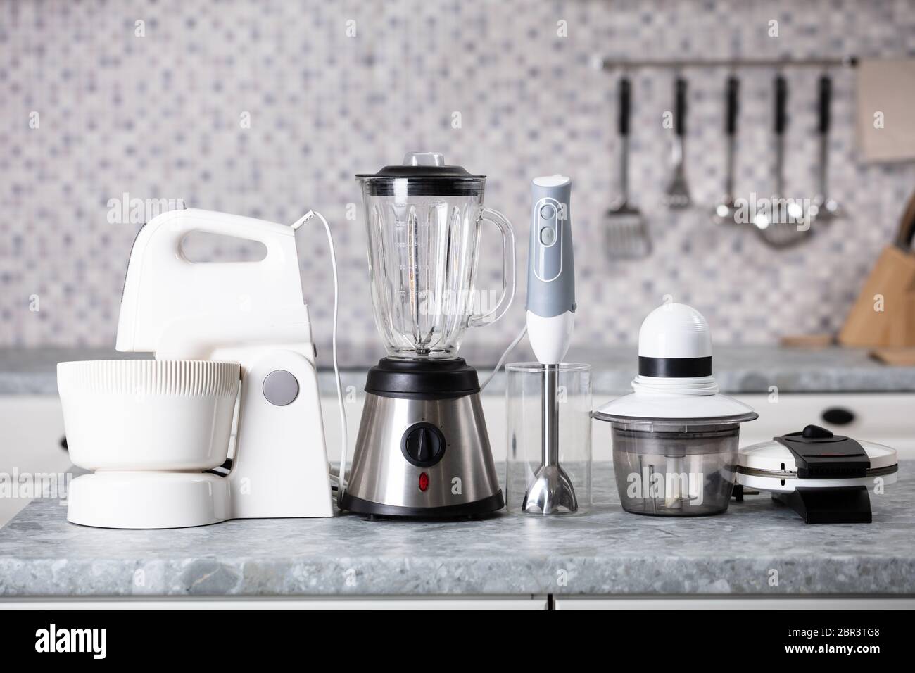 Various Type Of Kitchen Appliances On Worktop In Kitchen Stock Photo ...