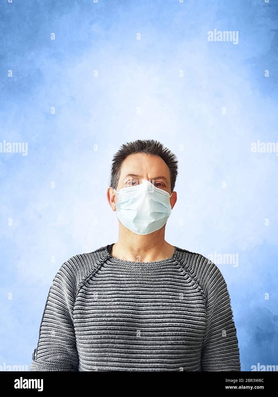 A man in a medical mask. Concept Heart transplanted man with medical ...