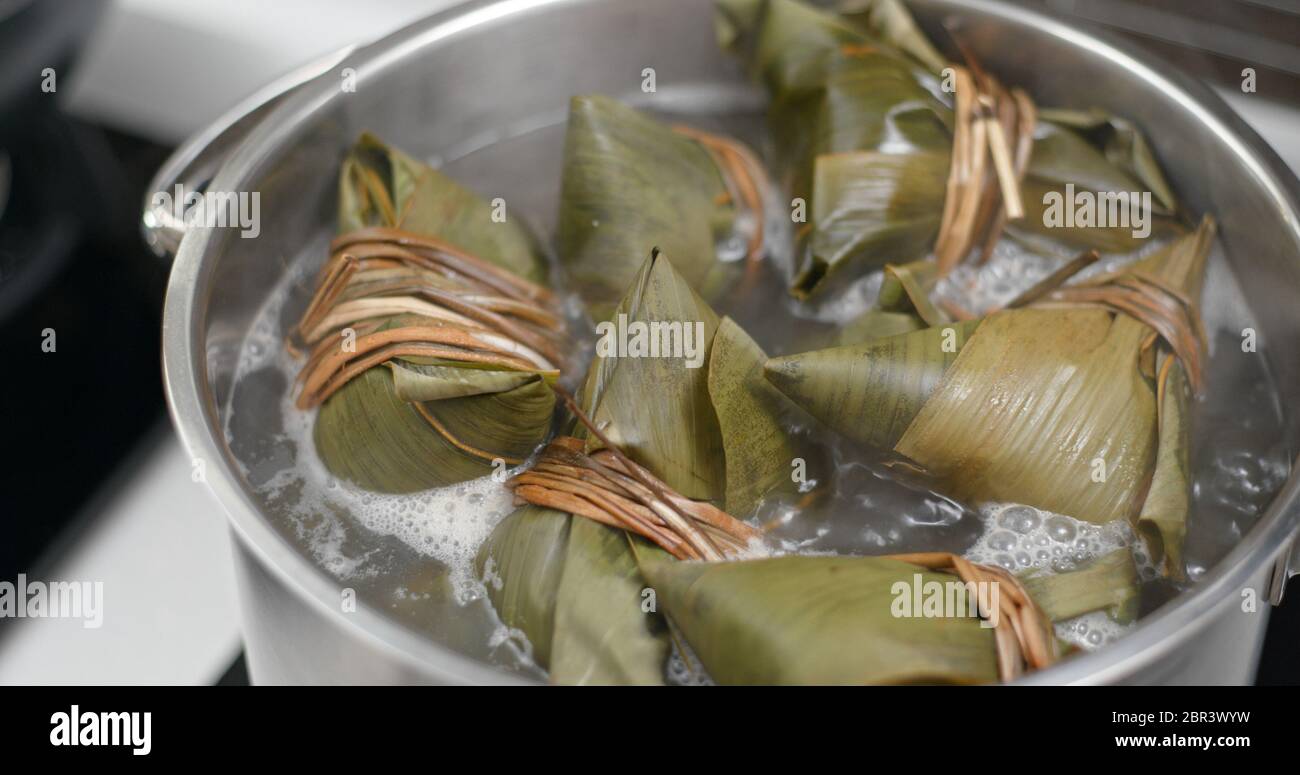 Cooking with rice dumpling Stock Photo - Alamy