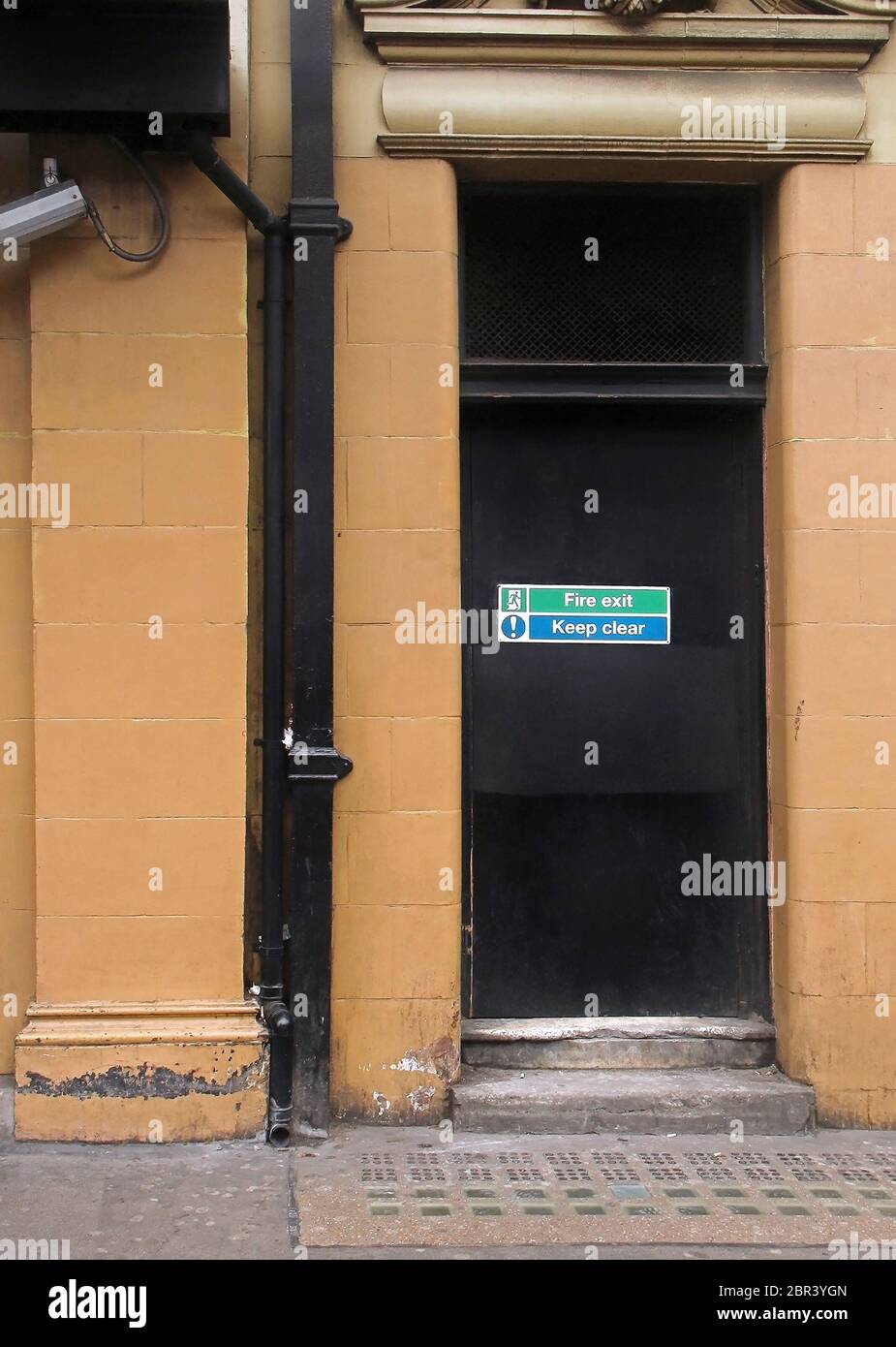 Fire exit door exterior with warning signs to keep clear Stock Photo ...