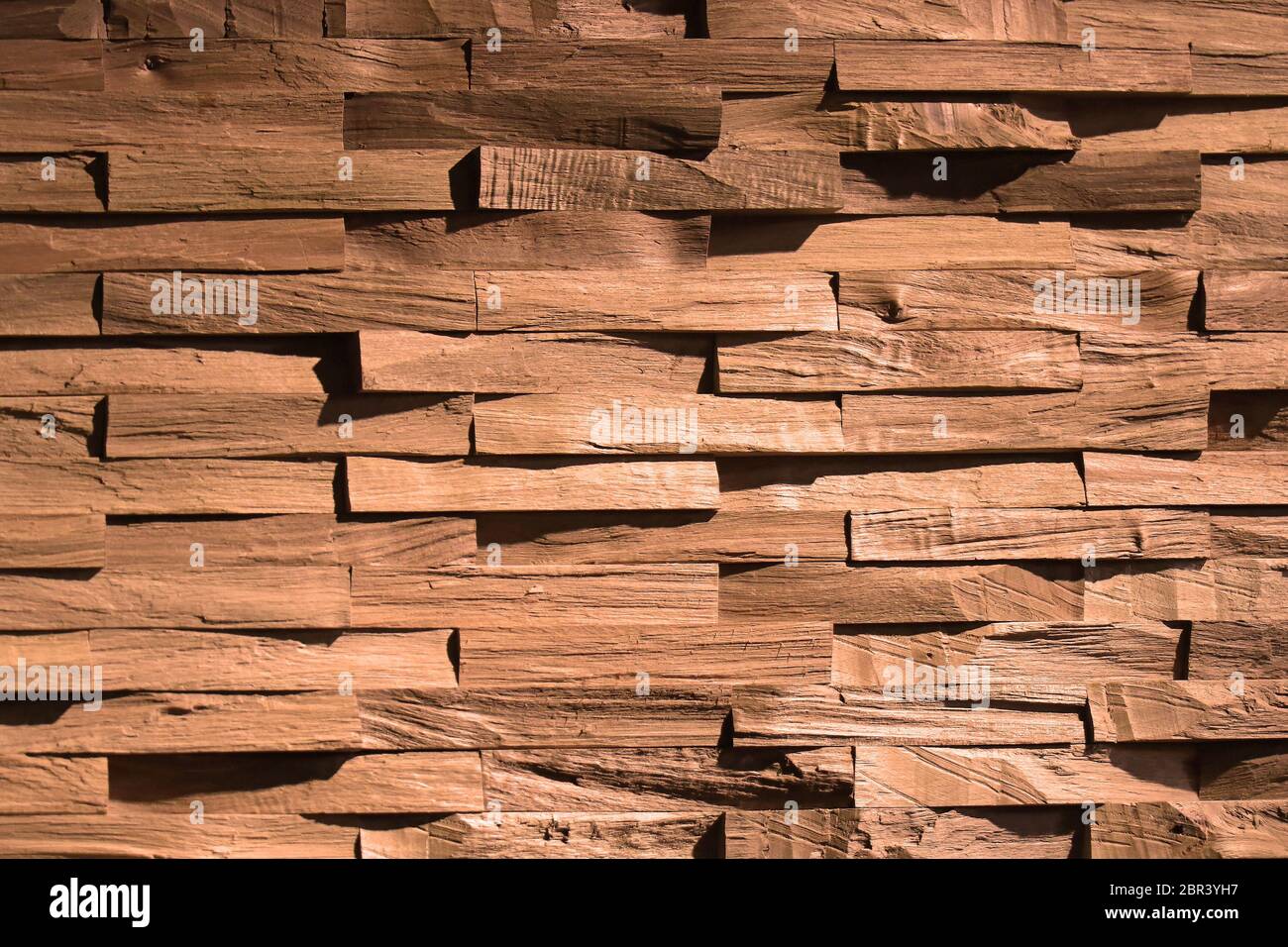 Wooden stacked tiles pattern on interior wall Stock Photo - Alamy