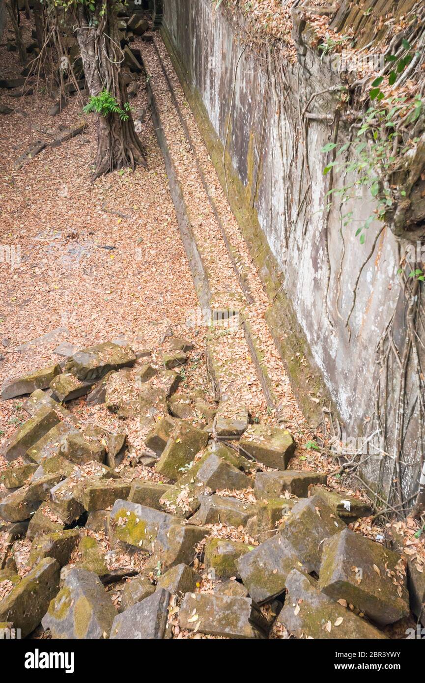 A pile of stone blocks at the Jungle Temple of Beng Mealea. Angkor ...