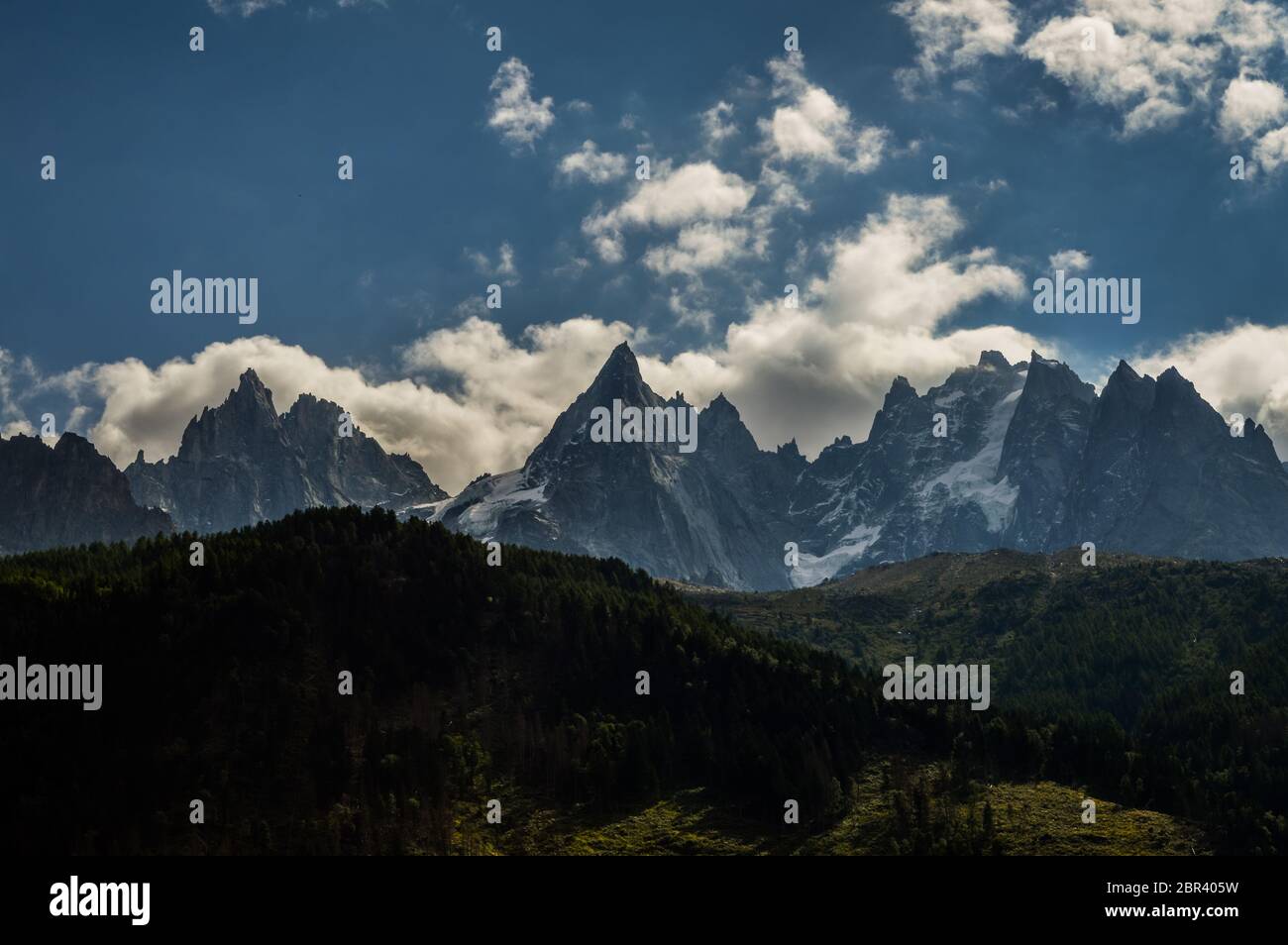 French Alps mountains in a cloudy summer day, seen from Chamonix, Haute ...