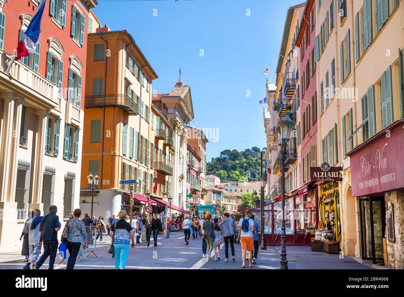 Nice, France - April 18 2017. Old bright colorful buildings in Nice ...
