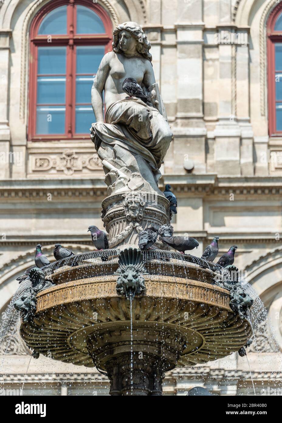 Details of the historical fountain with sculptures in front of the ...