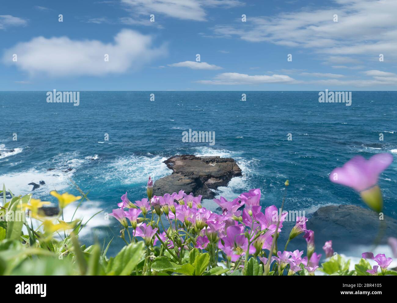 The beautiful beach with deep blue water and light blue sky and nice ...