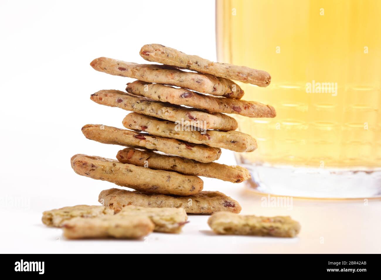Still life of glass mug with light beer, and cereal crispbread on a ...