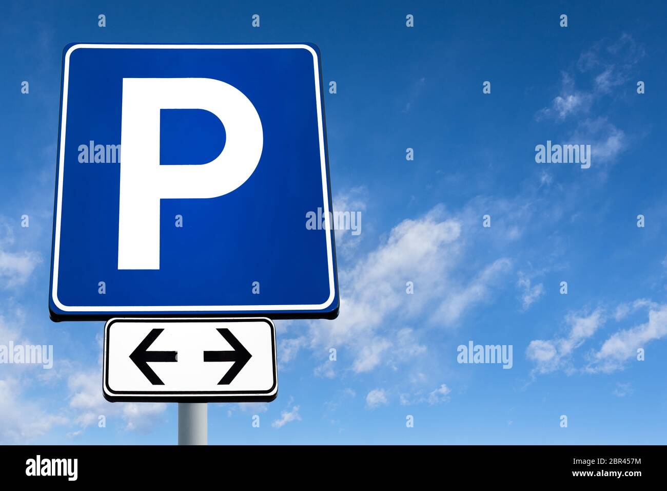 Parking signal with clouds and sky on background Stock Photo - Alamy