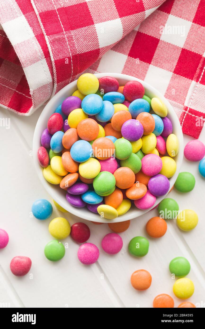 Colorful chocolate candy pills in bowl Stock Photo - Alamy