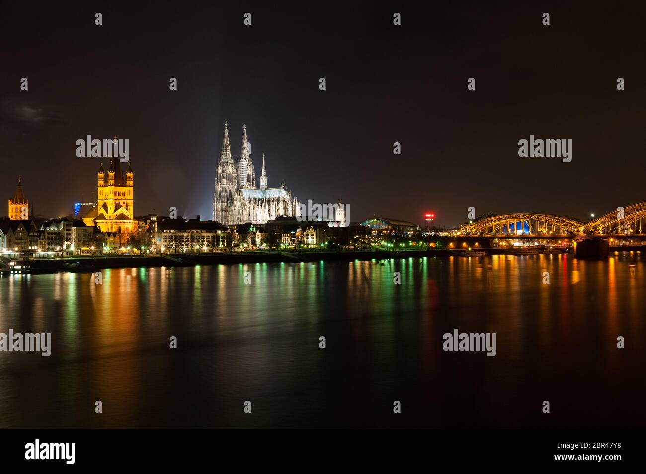 Cologne Cathedral and Hohenzollern Bridge at night Stock Photo - Alamy
