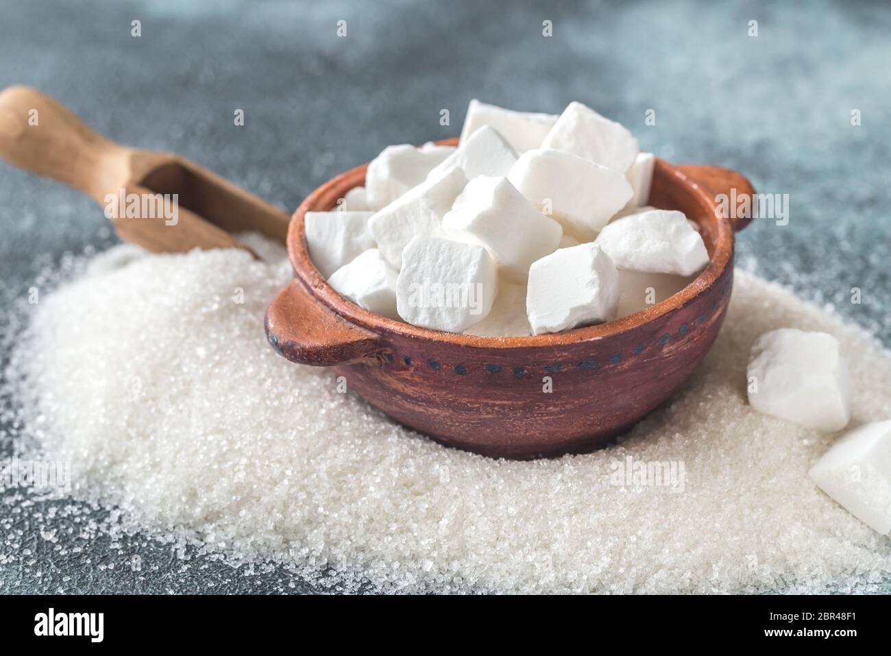 Lump and granulated refined sugar on the wooden background Stock Photo ...