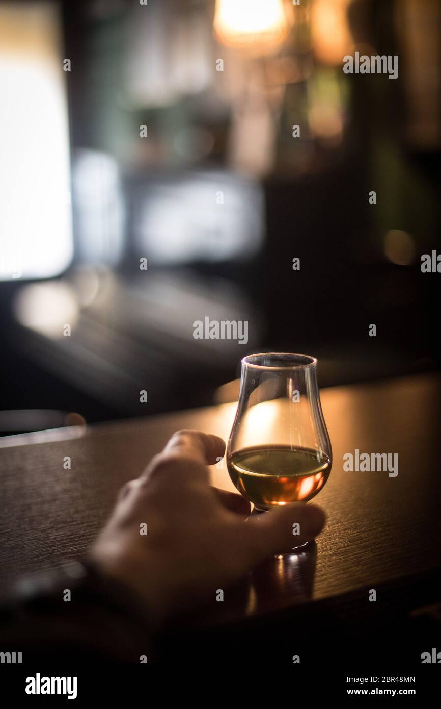 Hand grabbing a glass hi-res stock photography and images - Alamy