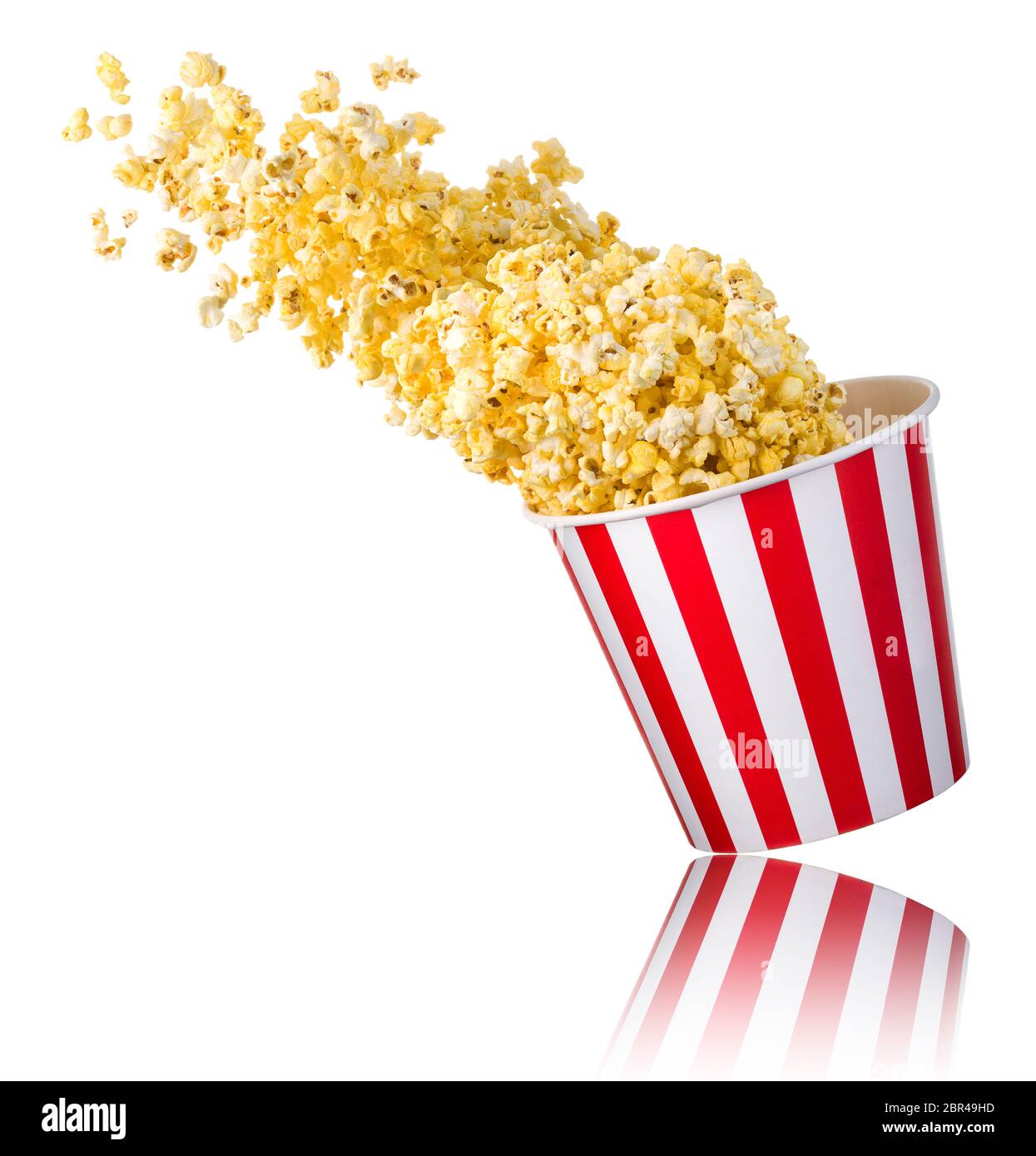 Flying popcorn from paper striped bucket isolated on white background ...