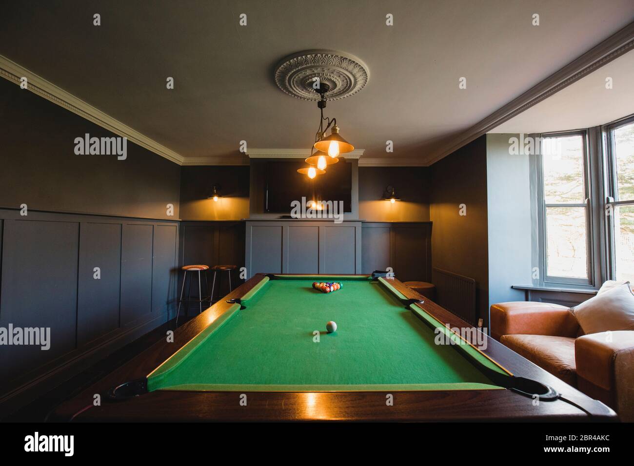 Wide angle view of an interior of a games room in a house Stock Photo ...