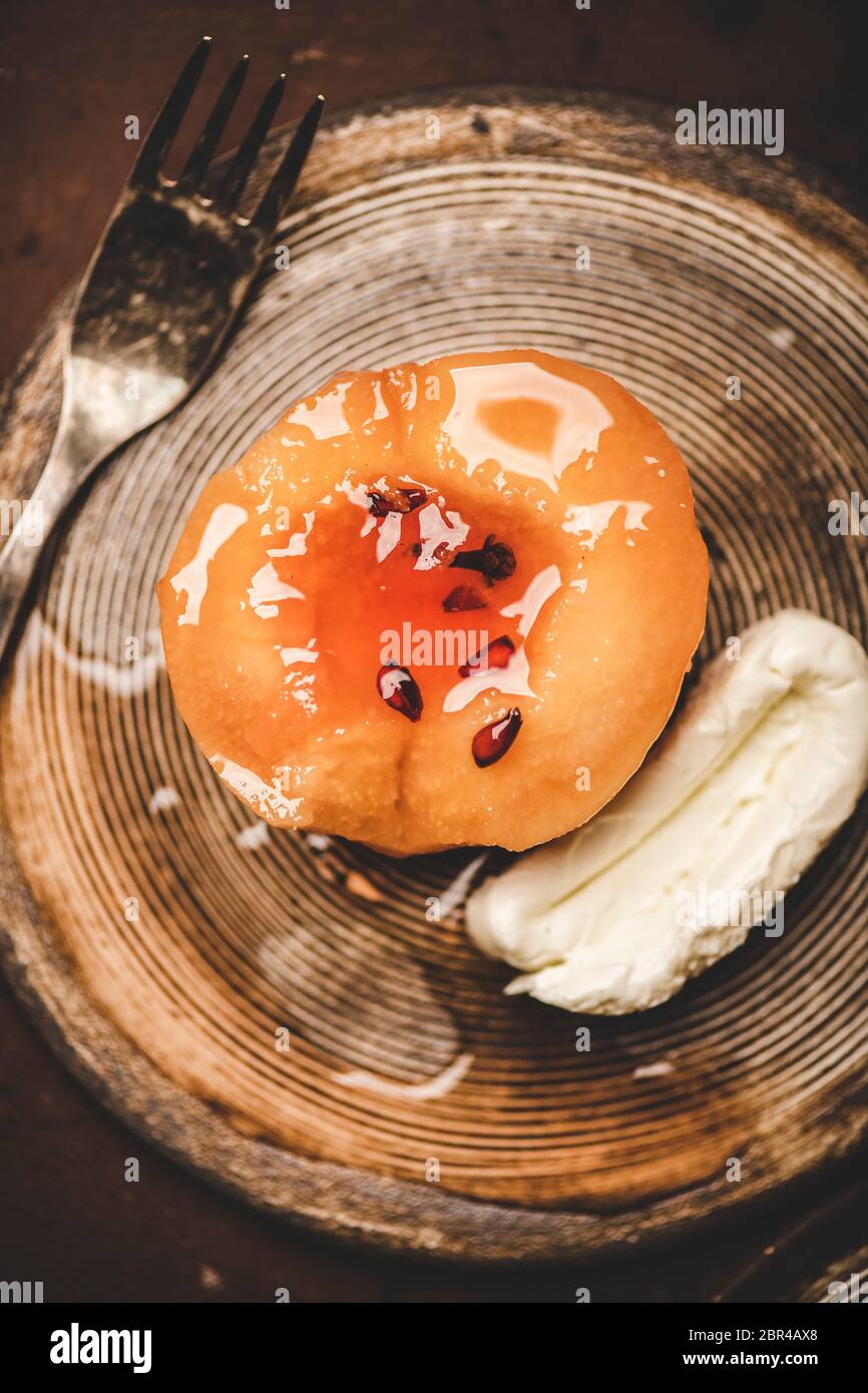 Turkish traditional dessert with sweet quince boiled in sugar syrup ...