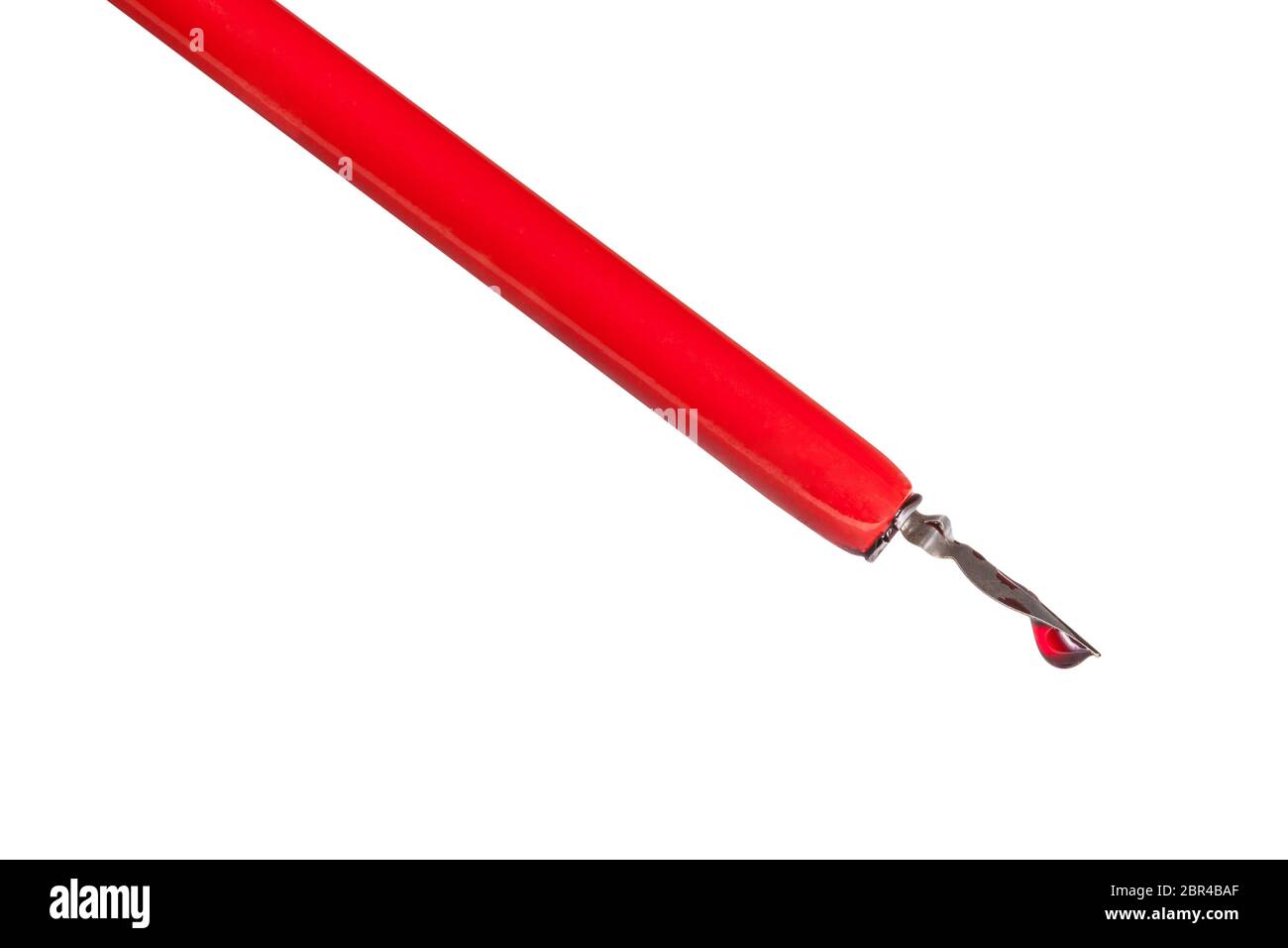 side view of ink drop in red nib pen close up isolated on white ...