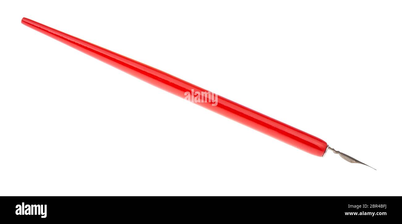 side view of dip pen with sharp steel nib and red pen holder isolated ...