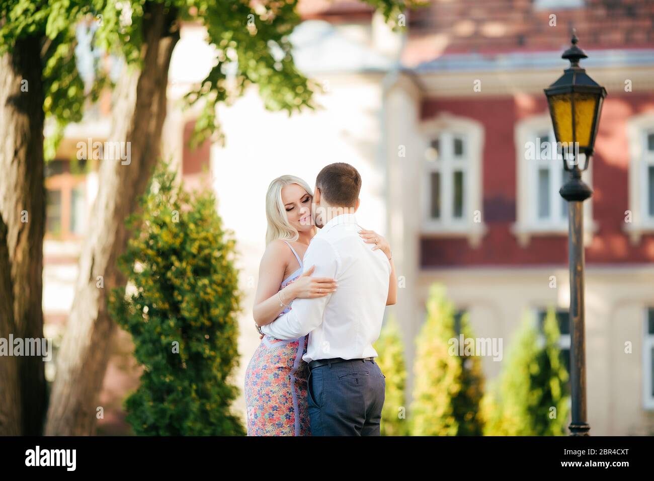 Romantic tourist couple walking around the city relaxing Stock Photo ...