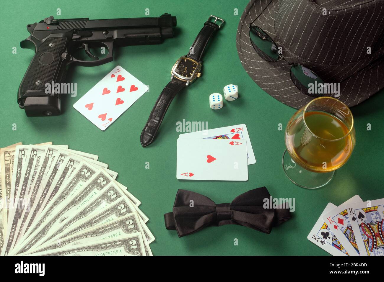 Gangster conceptual gun hat money hi-res stock photography and images ...