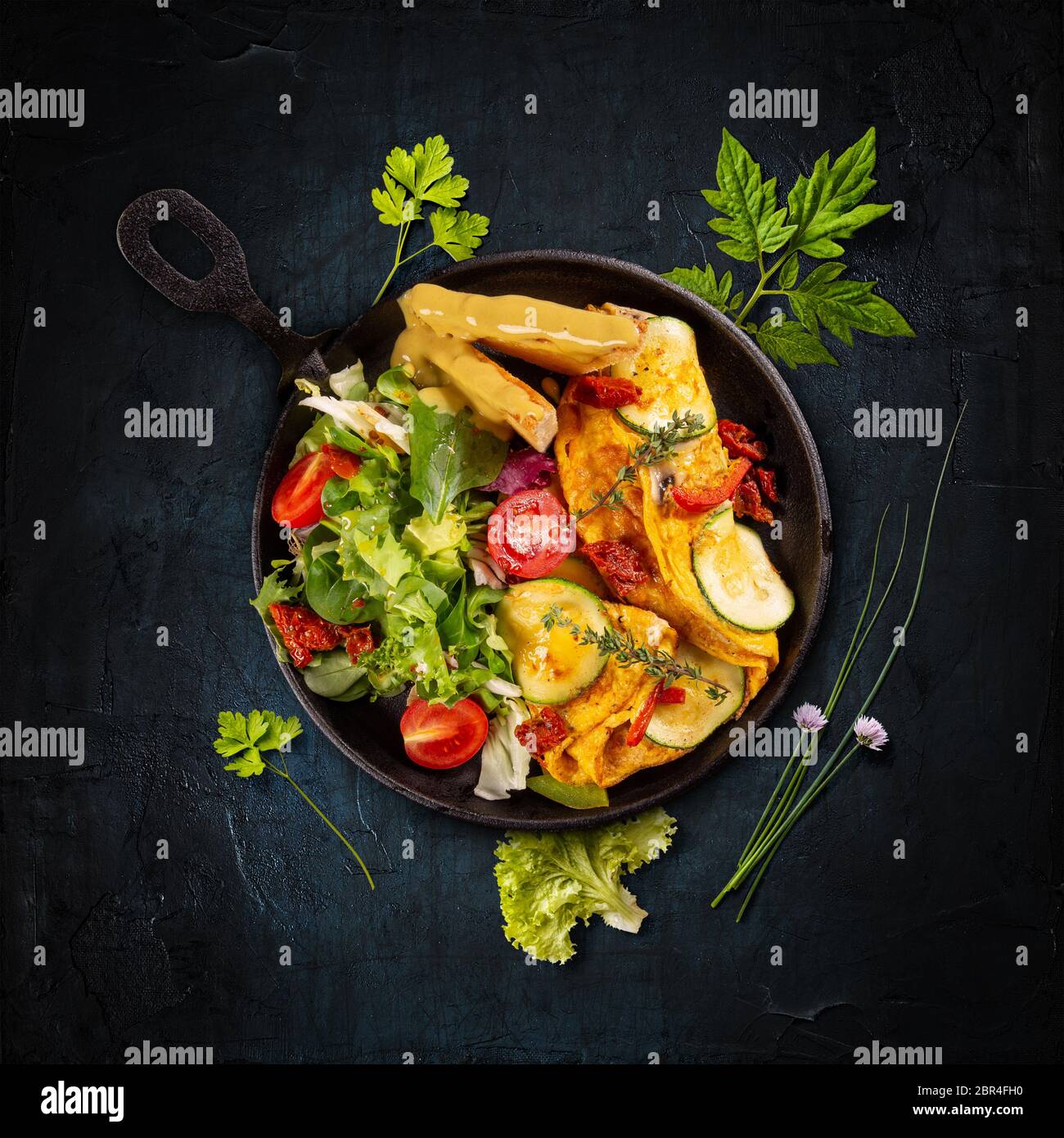 Flat lay of fresh homemade omelette with veggies Stock Photo - Alamy