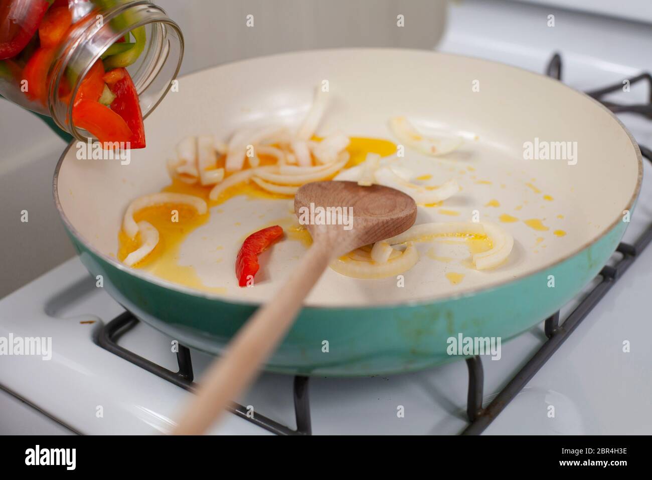 Adding green peppers hi-res stock photography and images - Alamy