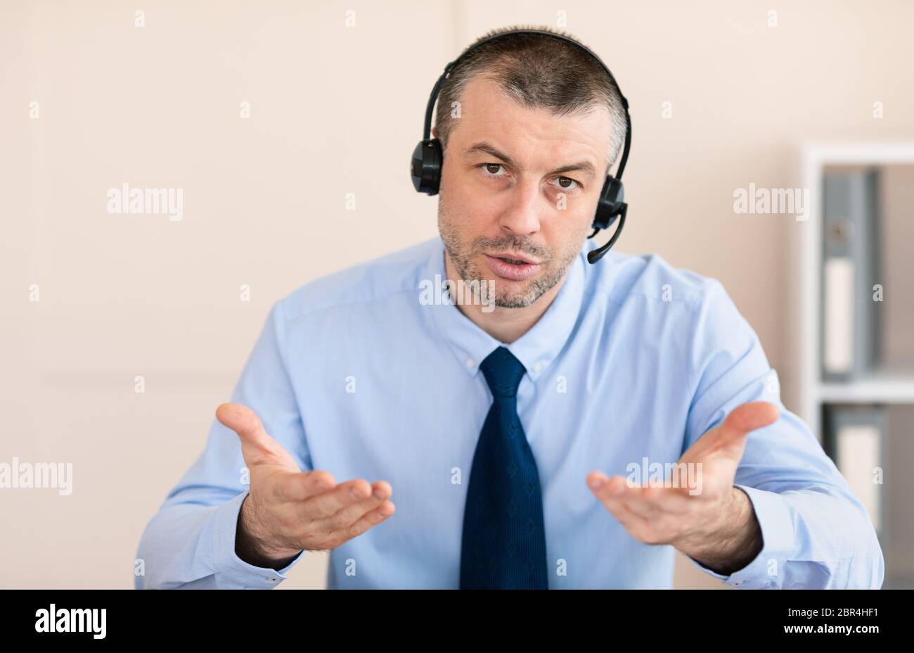 Man Talking With Customer Solving Problem Working In Call Center Stock ...