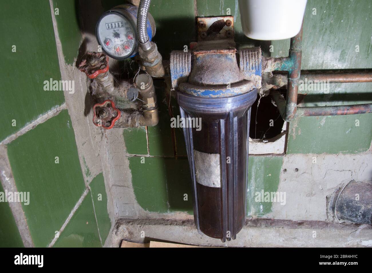 Very old rusty dirty Water filter somewhere in house cellar Stock Photo ...