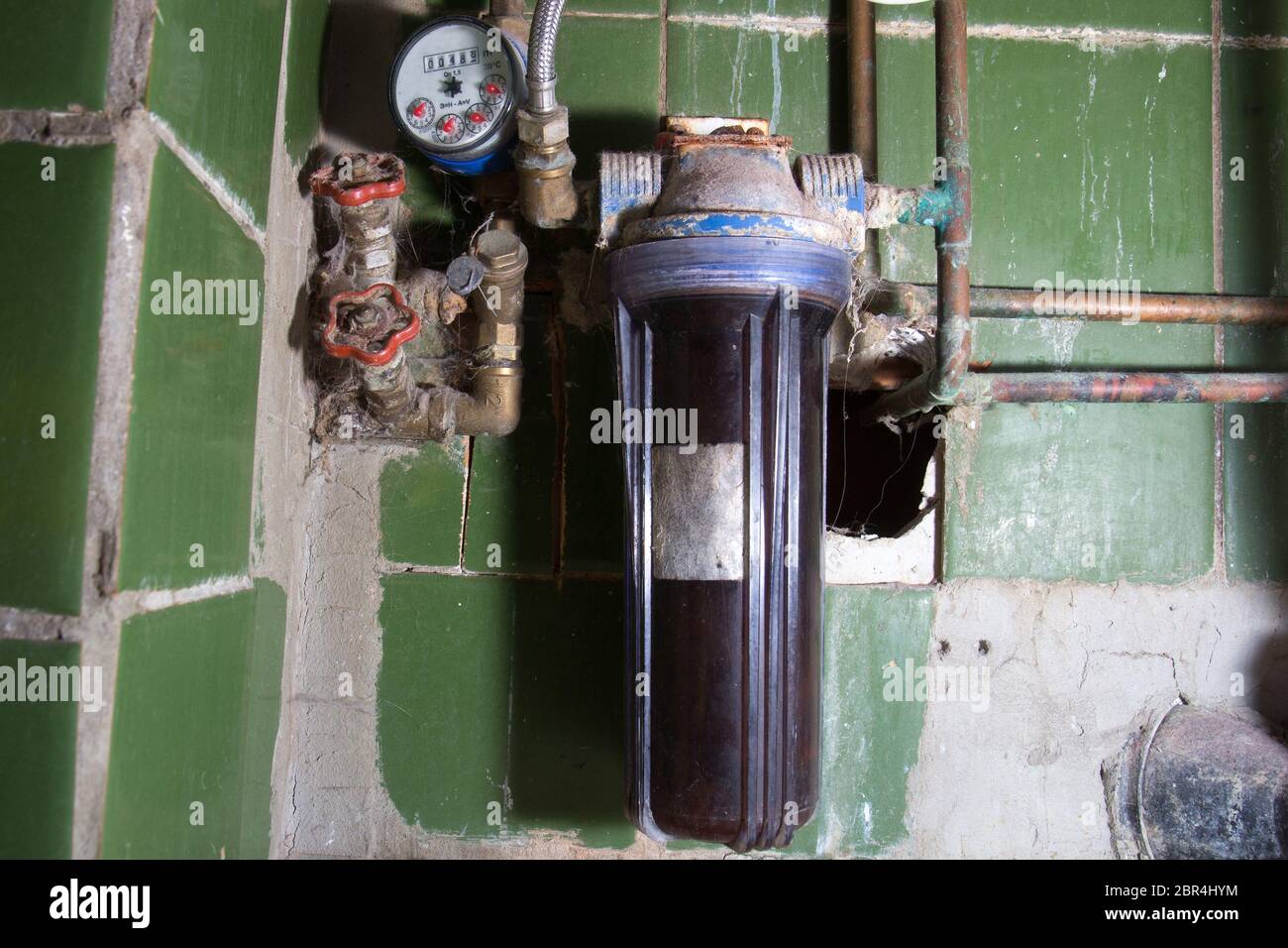 Very old rusty dirty Water filter somewhere in house cellar Stock Photo ...