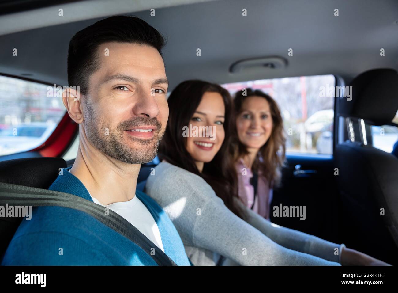 Group Of Happy Friends Having Fun In The Car Stock Photo - Alamy