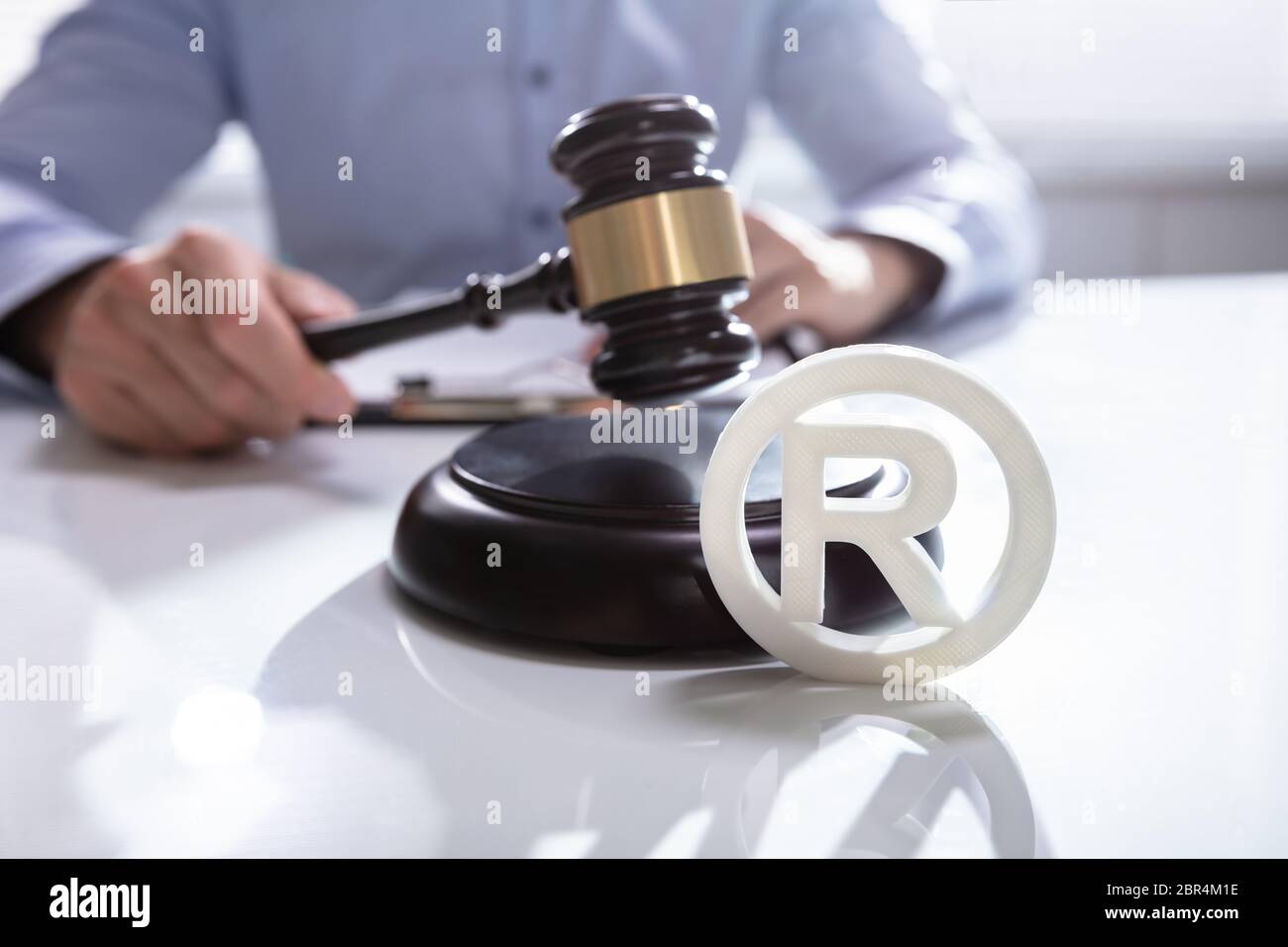 Close-up Of Judge Striking Mallet On Trademark Copyright Symbol Stock ...