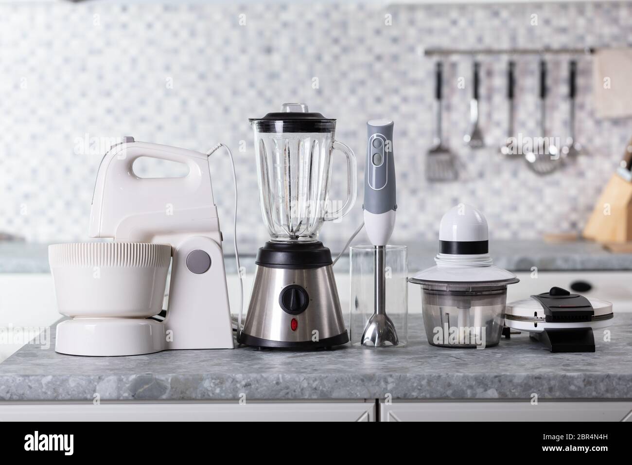 Various Type Of Kitchen Appliances On Worktop In Kitchen Stock Photo ...