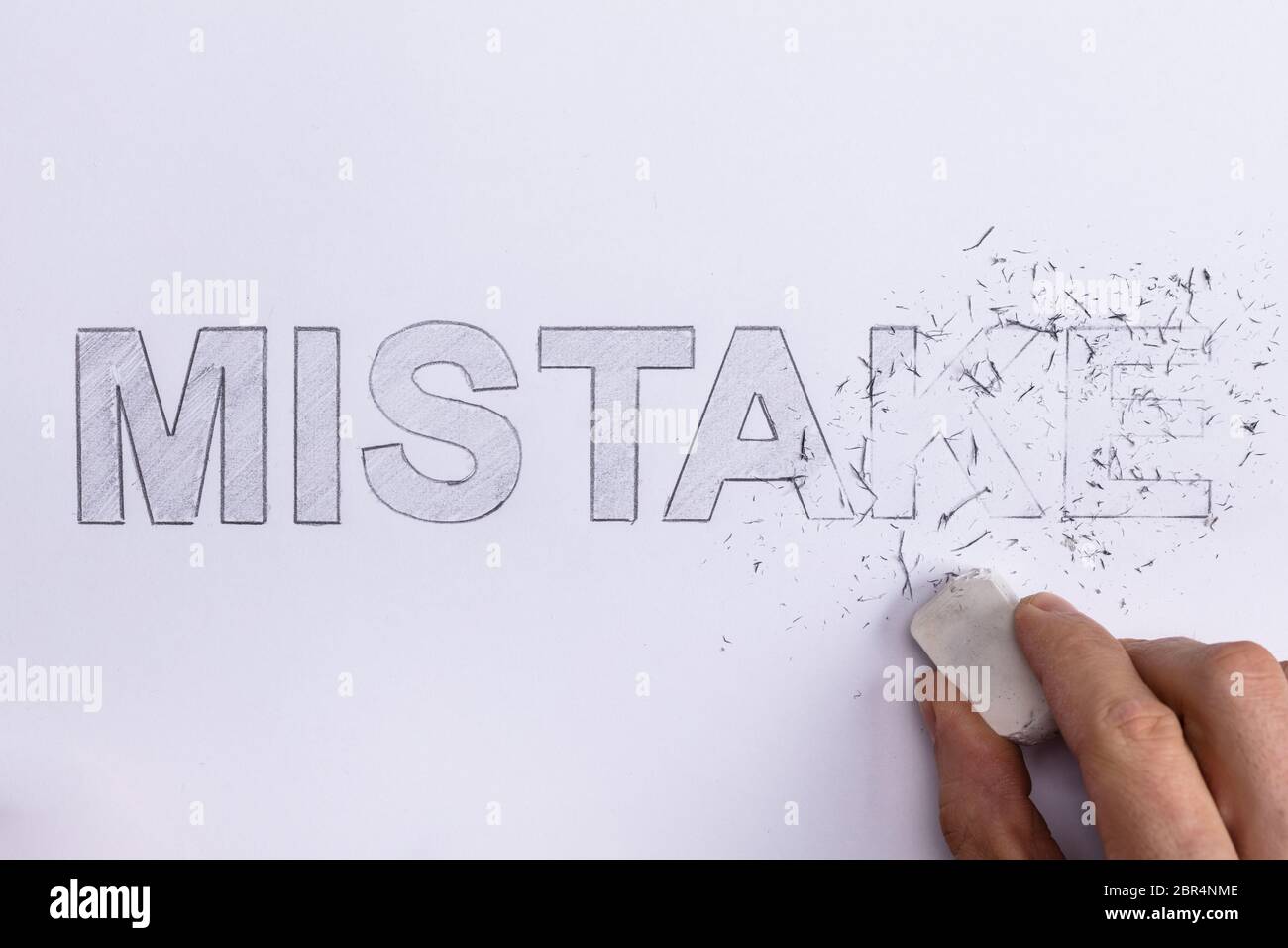 Hand holding eraser hi-res stock photography and images - Alamy