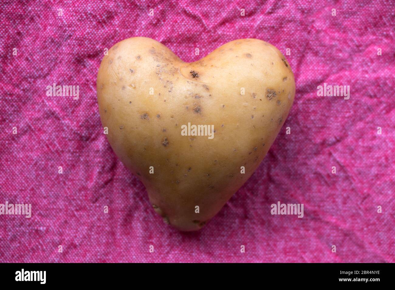 Heart shaped potato Stock Photo - Alamy