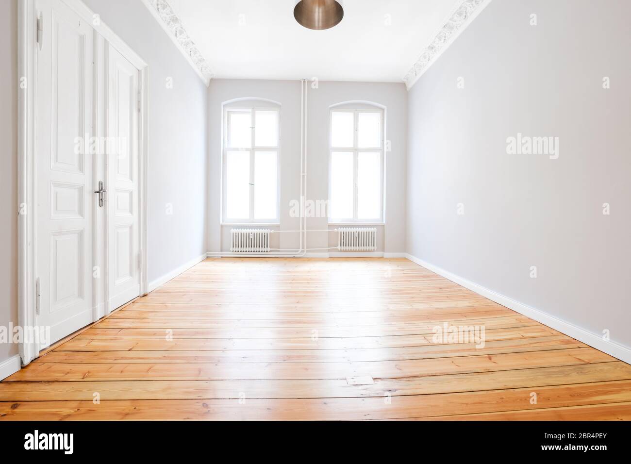empty apartment room with wooden floor after renovation Stock Photo - Alamy