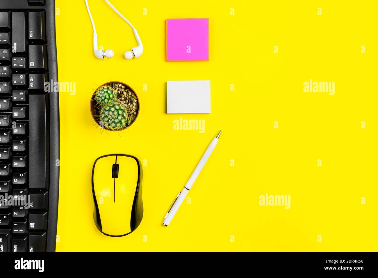 flat lay workspace yellow computer mouse, office accessory on yellow ...