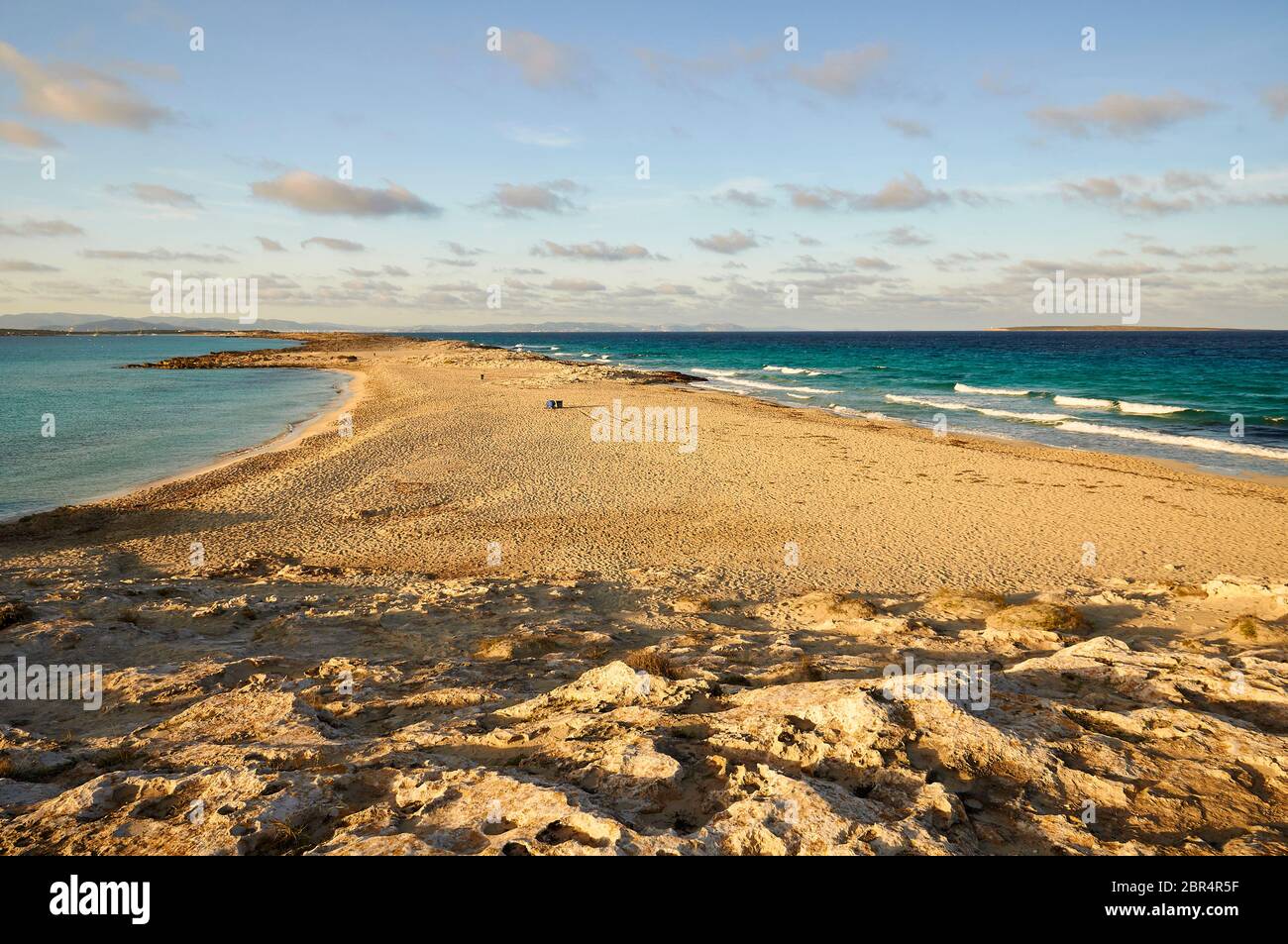 Sunset at the isthmus between Platja de Ses Illetes(left) and Platja de ...