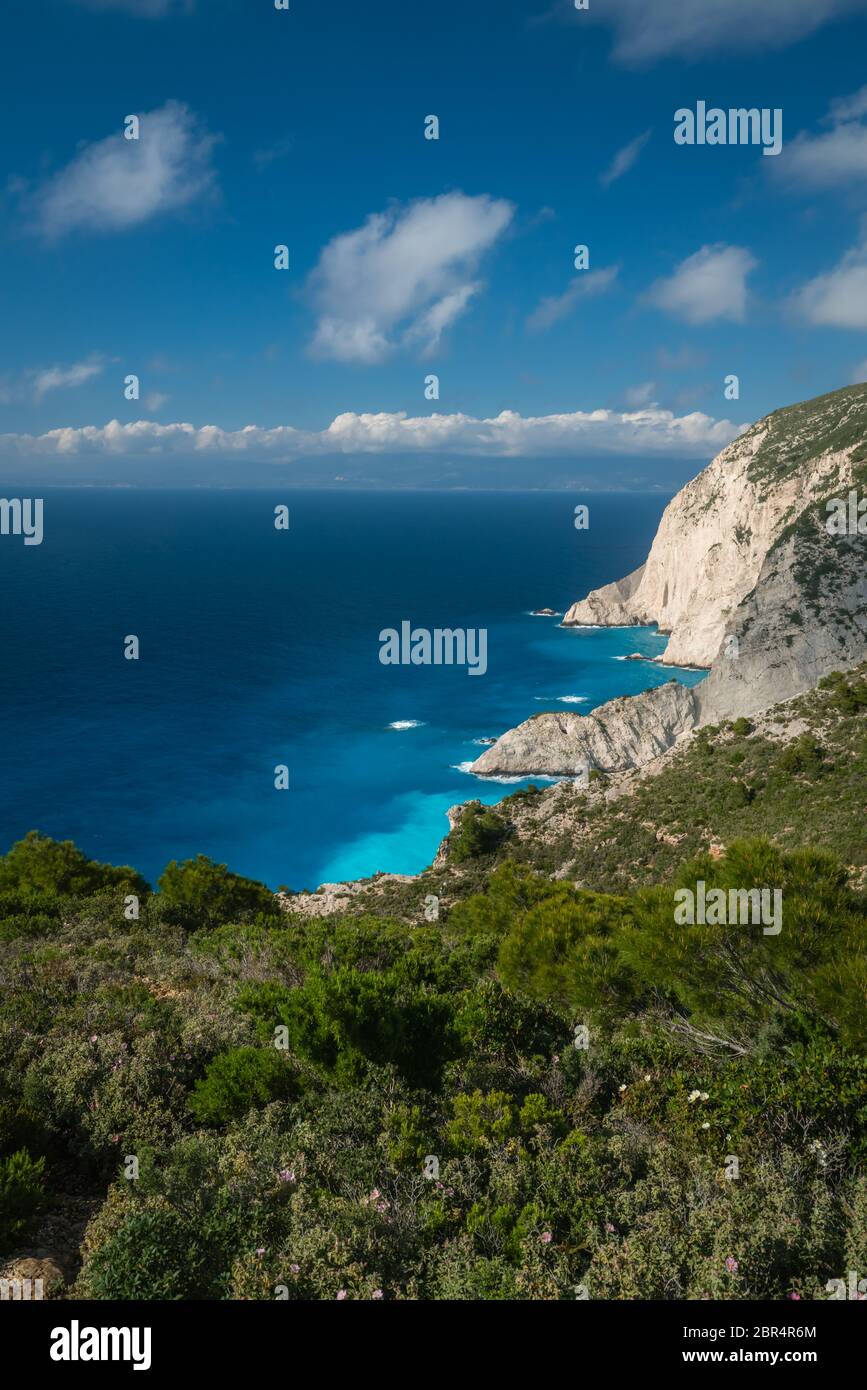 Cliffs above crystal clear turquoise waters near Shipwreck Cove in ...