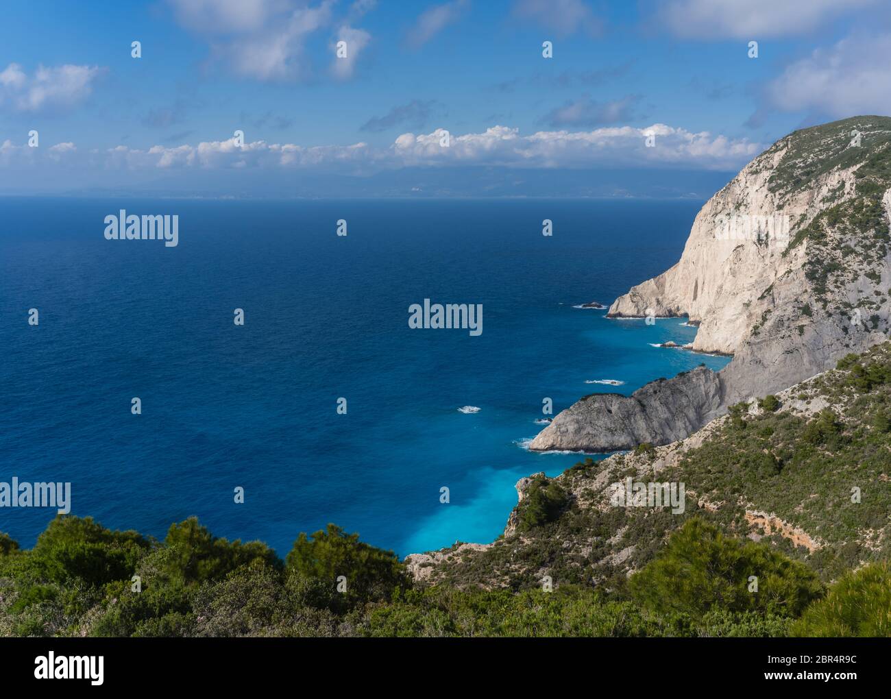 The cliffs near Shipwreck Cove in summer on Zante Island, Greece Stock ...