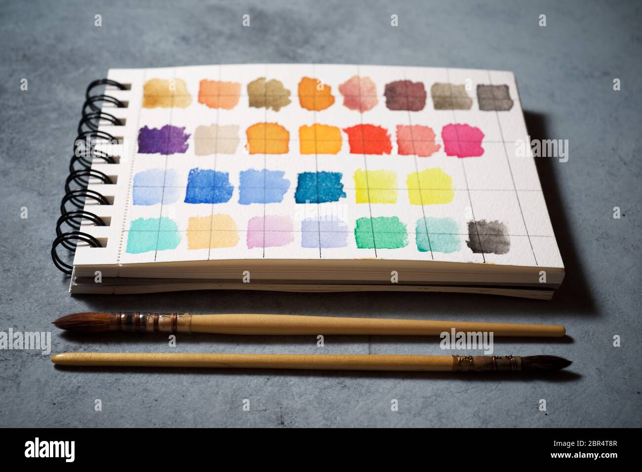 Watercolor test card on a sketchpad Stock Photo - Alamy