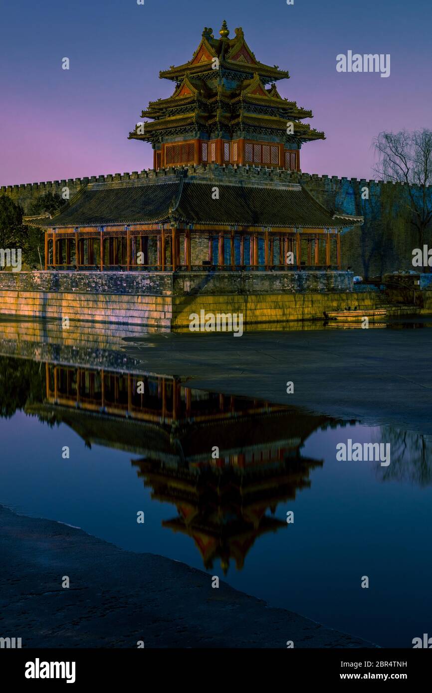 Northwestern tower of the Forbidden City Palace Museum, reflecting in ...