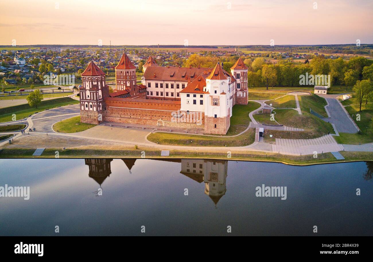 Aerial view of Medieval Mir castle complex at spring sunset. Famous ...