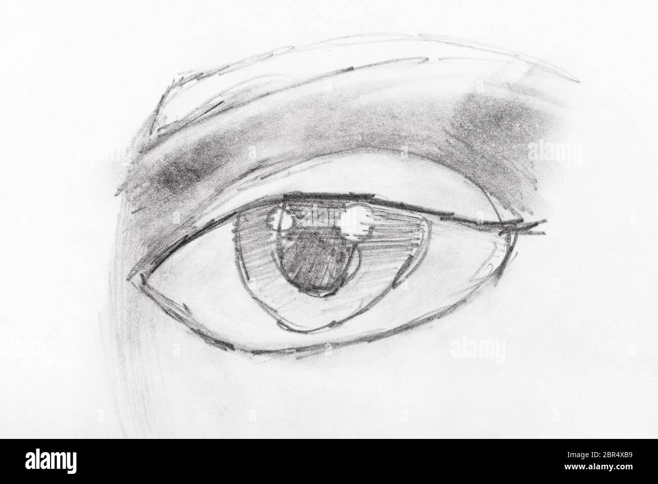 sketch of human eye and shadow around it hand-drawn by black pencil on ...