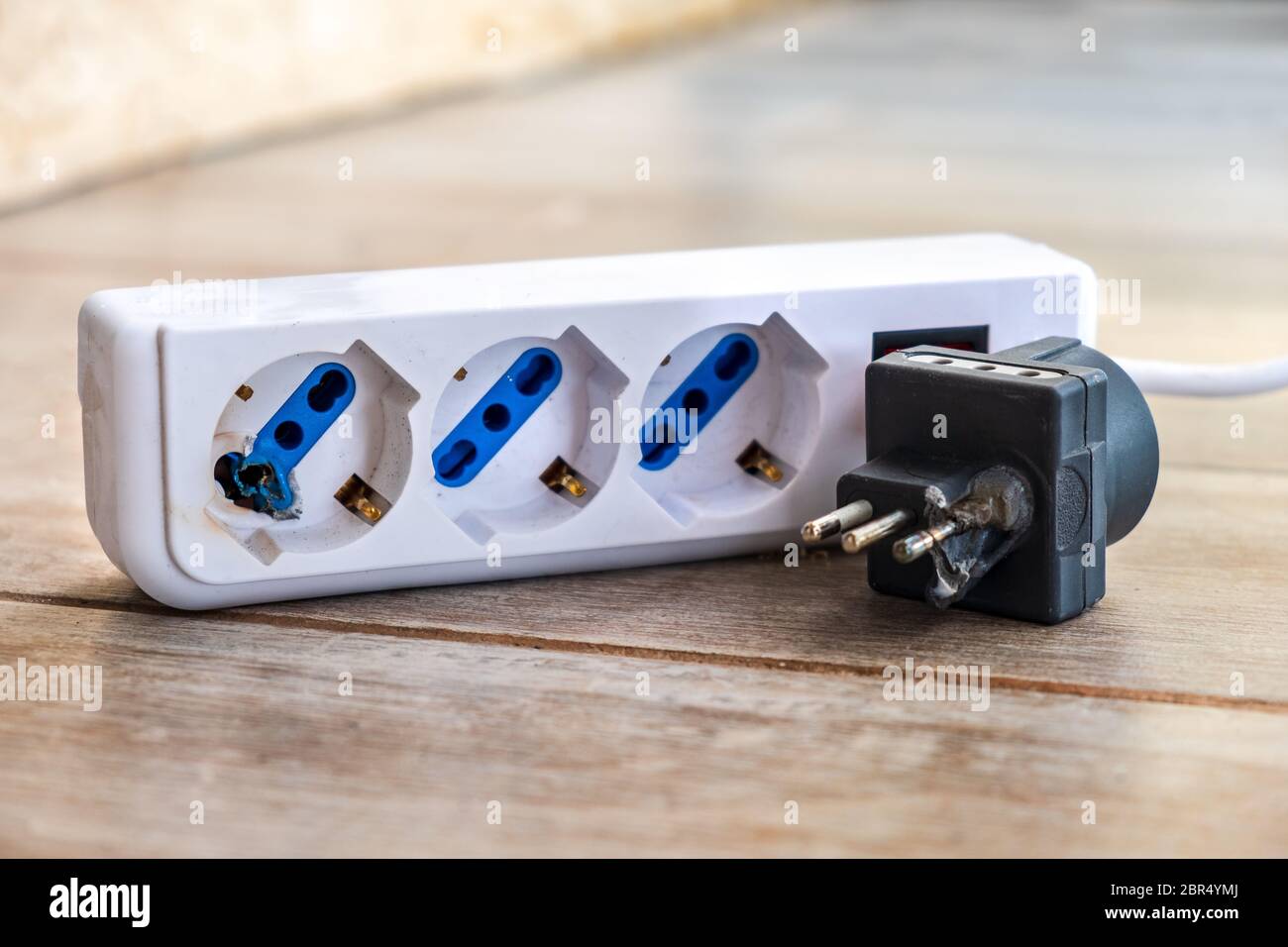 burnt power strip melted for electrocution danger copy space Stock ...