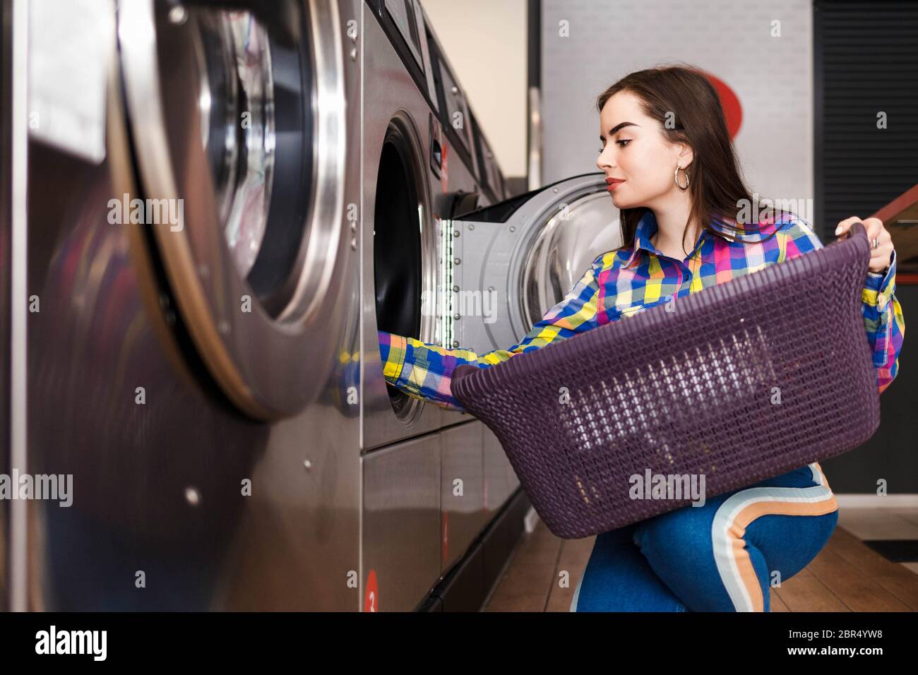 Woman Doing Laundry High Resolution Stock Photography and Images - Alamy