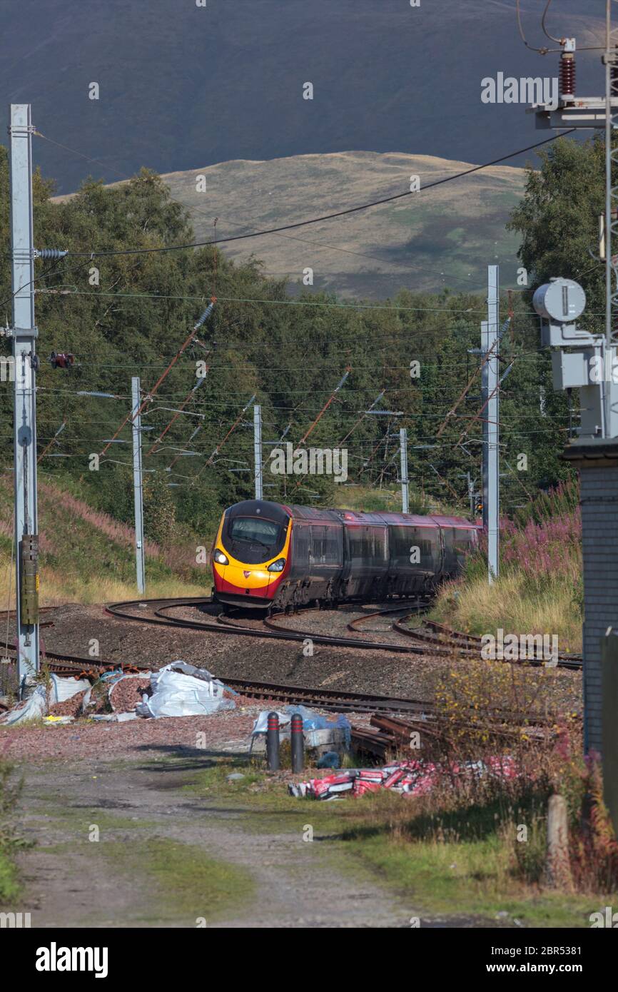 A Virgin Trains west coast class 390 Pendolino train tilting into the ...