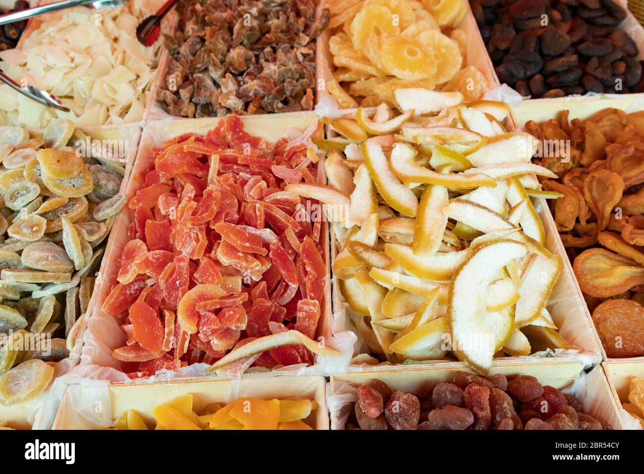 Colorful dried Fruit snacks on a market Stock Photo - Alamy