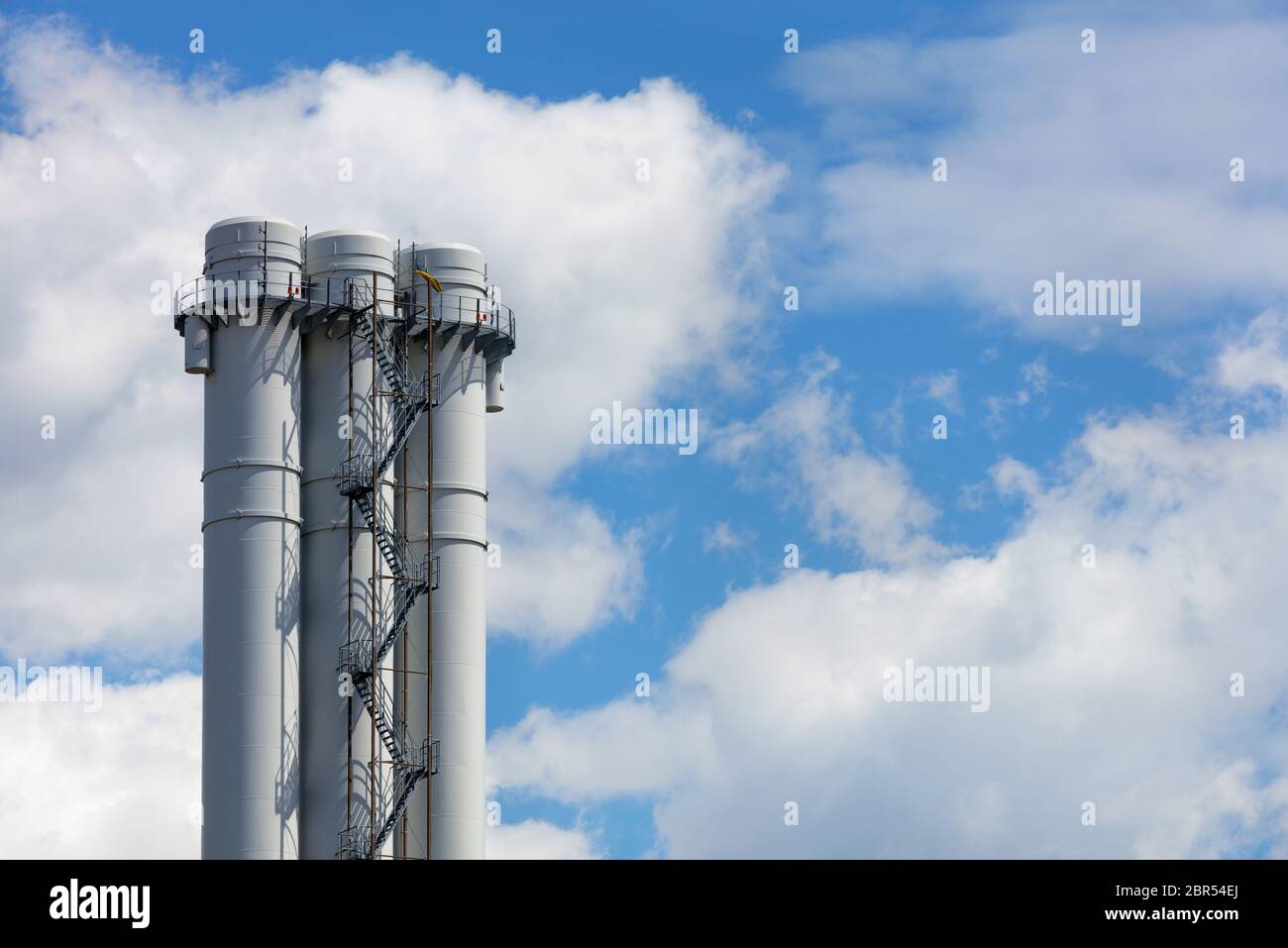 Industrial pipes without air pollution with an observation deck against ...